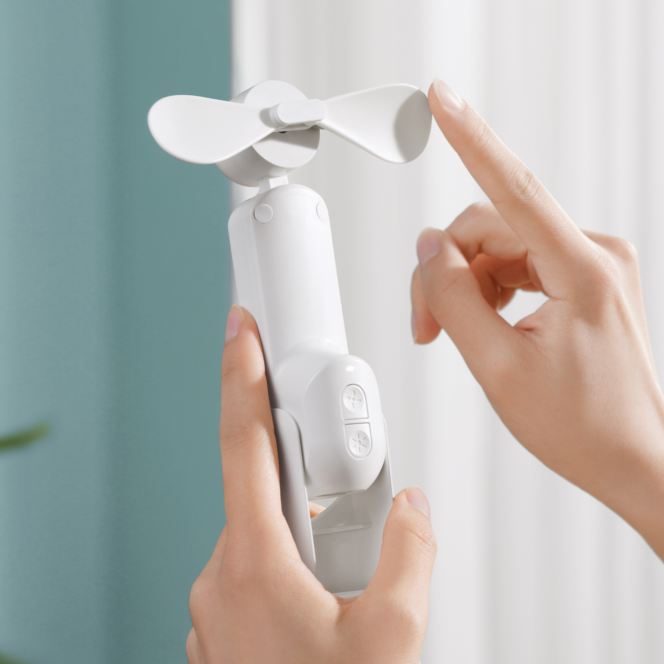 Best Hand Held Fan: Portable Cooling & Rechargeable – TrailSurvivor